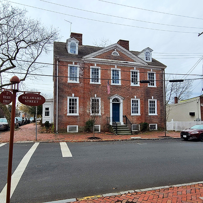The Amstel House stands proudly at the intersection of Fourth and Delaware, a Georgian time capsule with stories in every brick.