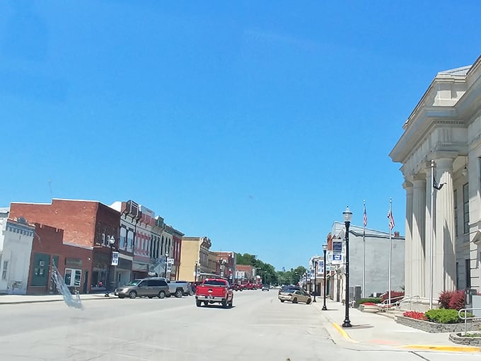 Main Street stretches toward the horizon, its historic buildings standing shoulder to shoulder like old friends sharing stories across generations.