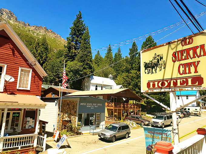 Sierra City greets visitors with its historic charm, from the Old Sierra City Hotel sign to the classic post office, all framed by the towering Sierra Buttes in the background.