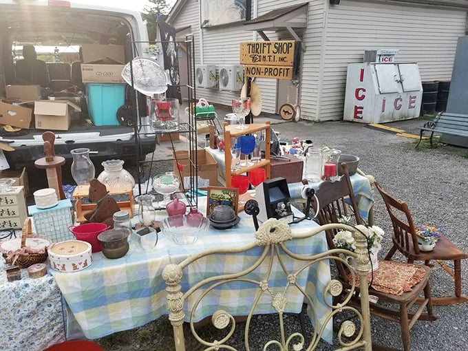 Domestic archaeology at its finest. Yesterday's treasures spill across checkered tablecloths, from vintage glassware to the perfect shabby-chic chair.