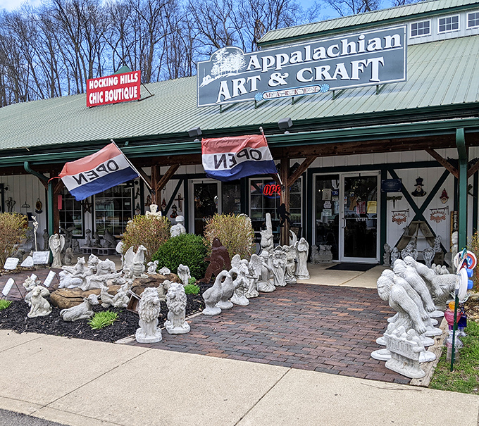 Garden statuary stands guard outside Appalachian Art & Craft, silently judging your decision not to buy that handcrafted birdhouse.