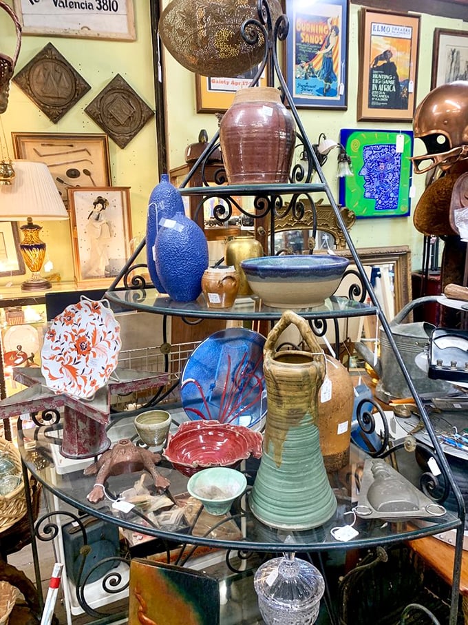 Art glass and pottery arranged like a three-dimensional color wheel. That blue vase is practically begging to hold your farmers' market sunflowers.
