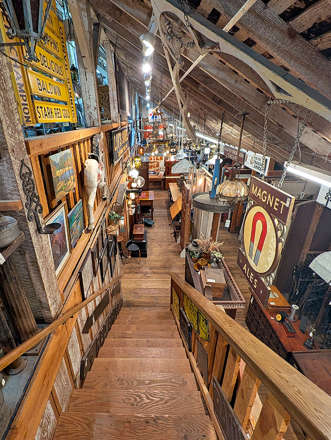 Looking down from the upper level of Aurora Mills reveals a wonderland of architectural salvage where vintage signs and weathered wood await new purpose.