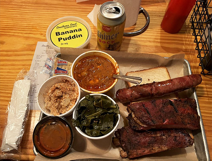 A barbecue sampler that hits all the high notes—ribs, sausage, and sides that make you want to start a standing ovation right at your table.