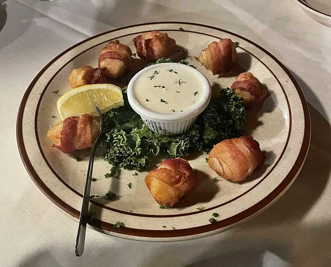 Bacon-wrapped scallops: proof that sometimes the simplest combinations create the most profound flavors. Pure genius on a plate.