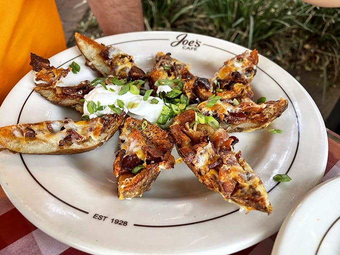 Potato skins that haven't forgotten their purpose in life: to deliver maximum flavor with minimal pretension. Comfort food engineering at its finest.