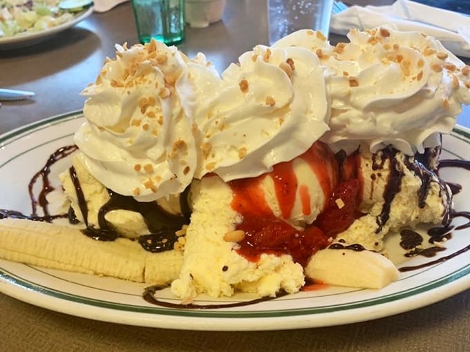 Dessert that doesn't whisper but announces itself with a parade of whipped cream peaks, caramel rivers, and banana valleys. Spoon-licking guaranteed.