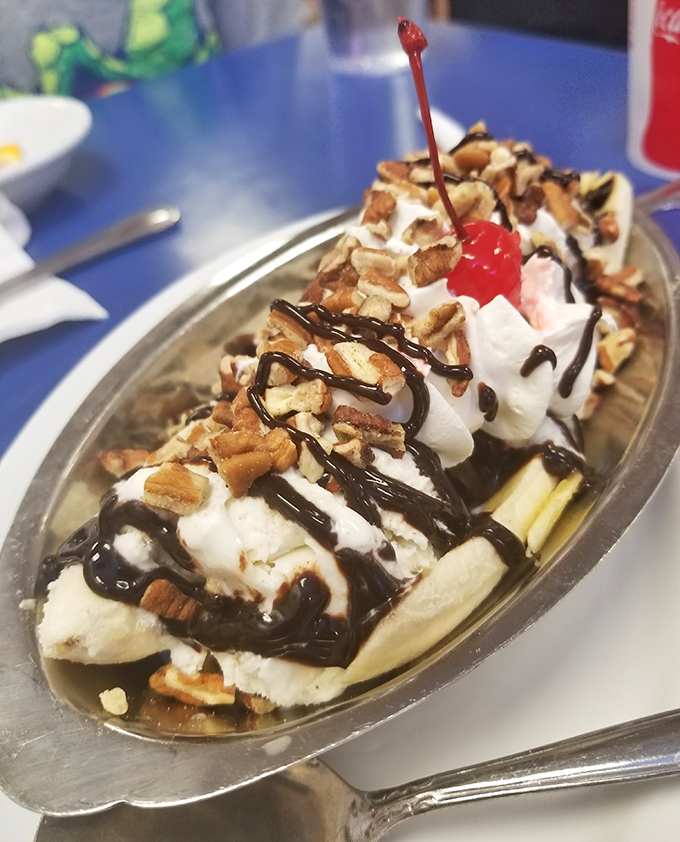 A banana split that doesn't just satisfy your sweet tooth&mdash;it throws a party for it. Whipped cream mountains, chocolate rivers, and that iconic cherry on top.
