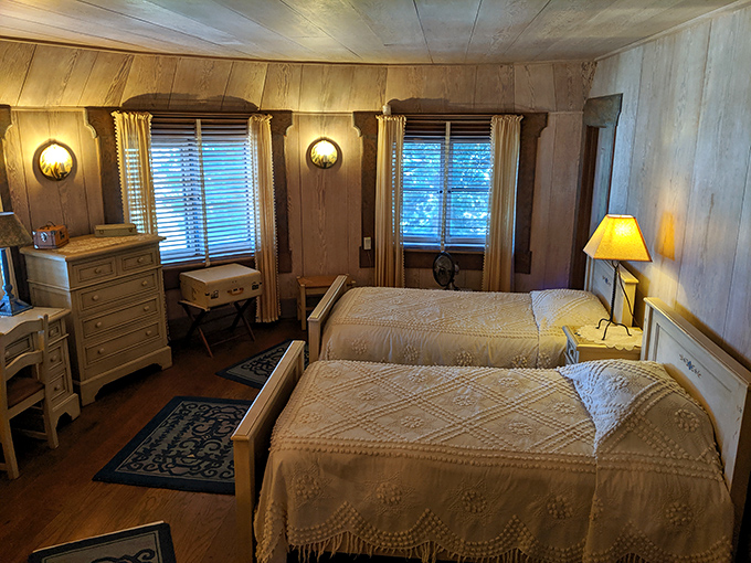 Scandinavian simplicity meets mountain comfort. This bedroom's clean lines and handcrafted furniture offer a glimpse into the castle's lived-in history.