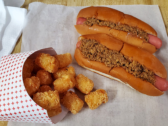 The classic beef hot dog with tater tots &ndash; proof that sometimes the simplest pleasures are the most profound. Childhood nostalgia never tasted so good.