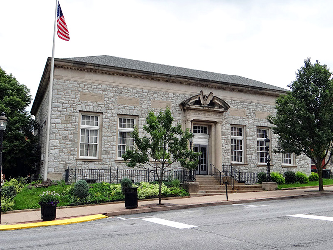 The post office's limestone facade suggests even mail delivery once had more dignity and architectural flair than today.