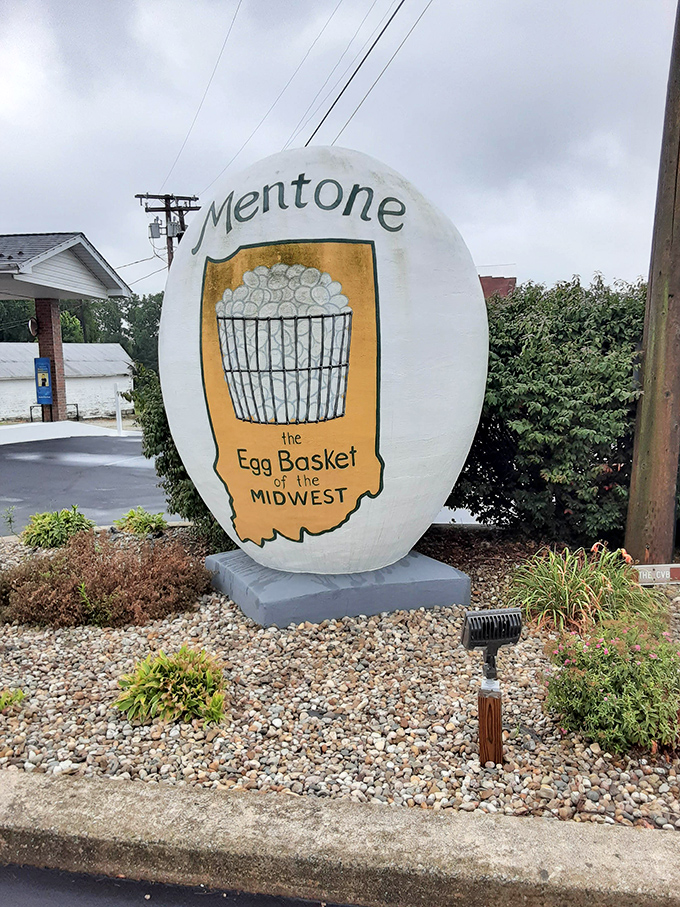 Against moody Indiana skies, the egg stands as a beacon of small-town identity &ndash; unchanging while clouds drift by.