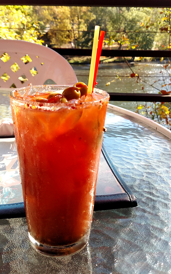 A Bloody Mary with a view&mdash;spicy, tangy, and garnished with enough olives to count as a salad course.