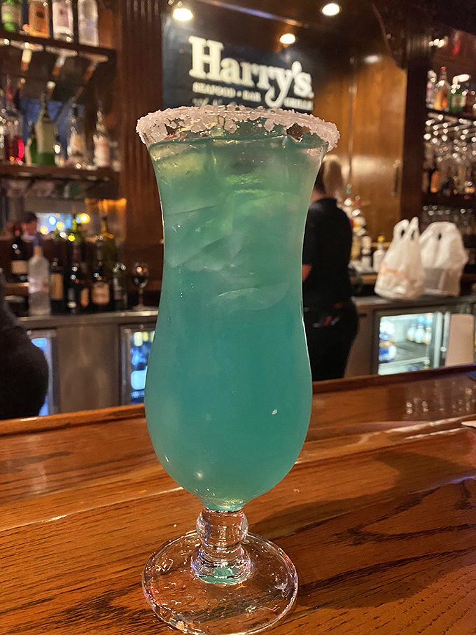 This electric blue cocktail isn't just a drink—it's a vacation in a glass, complete with the salt-rimmed promise of good decisions to come.