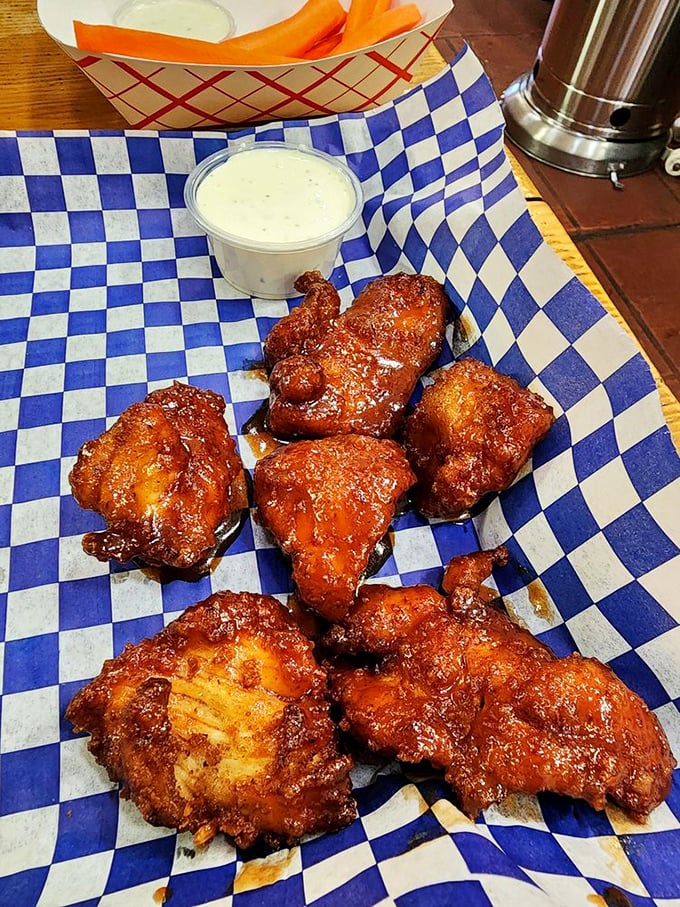 These aren't just chicken wings&mdash;they're flavor grenades, each one coated in sauce that strikes the perfect balance between sweet, tangy, and "can I lick my fingers in public?"