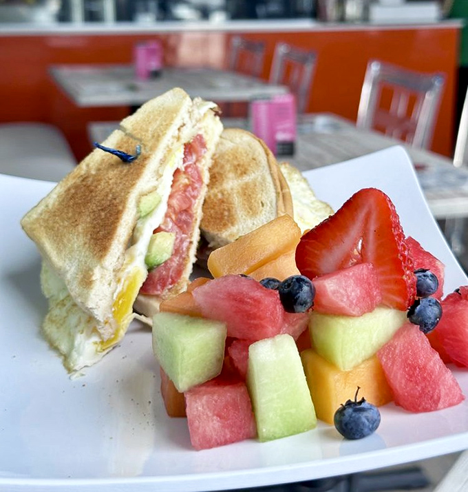 Breakfast reimagined with island flair. That fruit medley isn't just a side&mdash;it's nature's candy bringing sunshine to your morning.