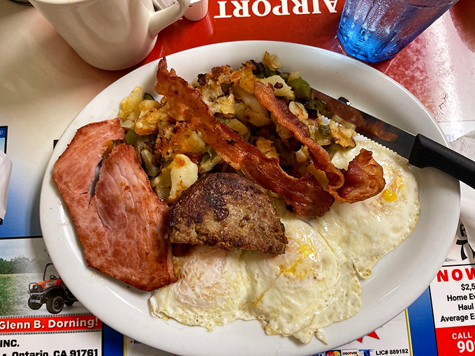 The breakfast platter that answers the eternal question: "Why choose between bacon, ham, and eggs when you can have it all?"