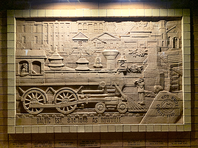 This intricate brick wall sculpture captures a moment in local history, telling stories in stone that would take thousands of words to express&mdash;the ultimate low-tech PowerPoint.