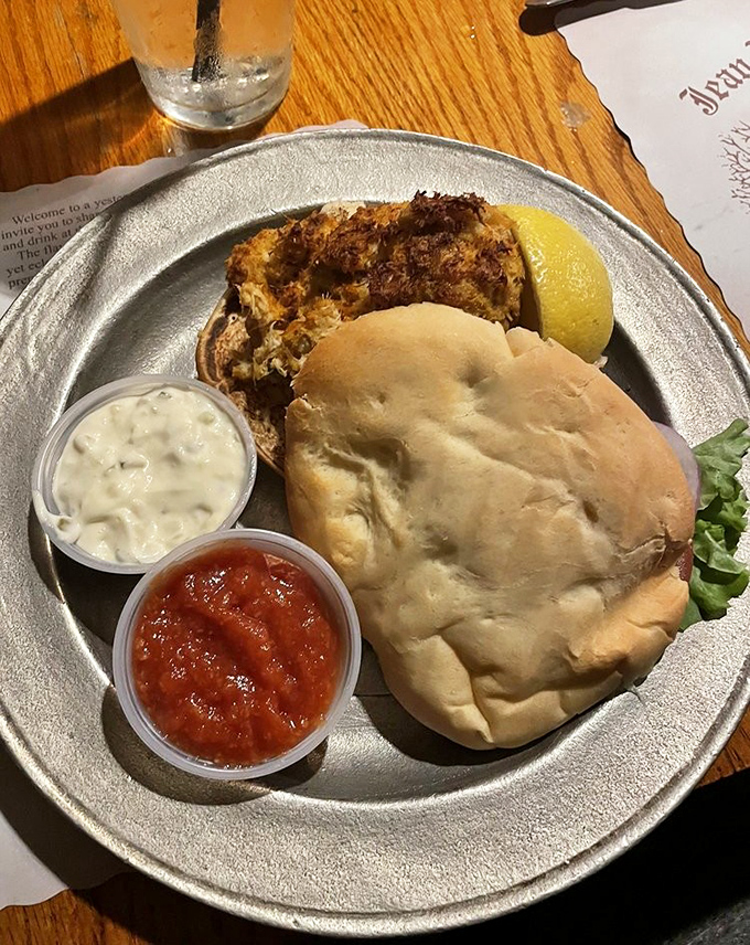 A crab cake sandwich that's mostly crab and barely cake, served with house-made condiments that elevate seafood to an art form.