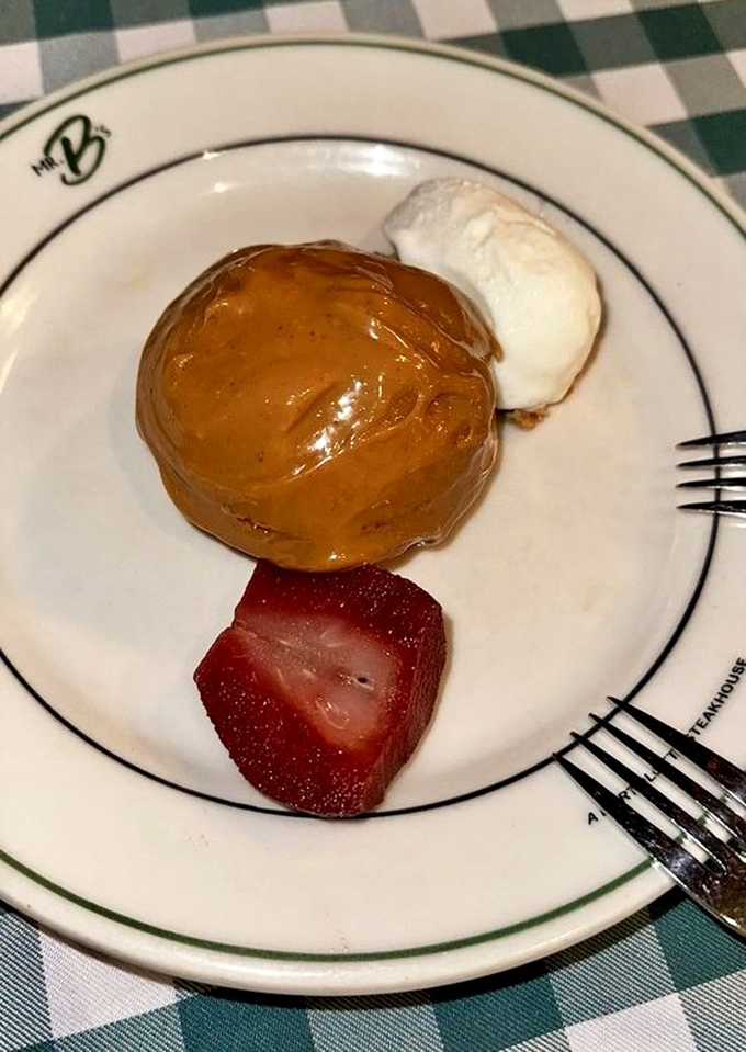 Dessert that makes you close your eyes involuntarily&mdash;caramel-kissed cake with a scoop of vanilla ice cream and fresh strawberry.