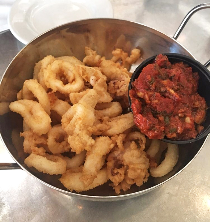 Calamari that defies the rubbery reputation of lesser versions&mdash;light, crisp, and ready for a dip in that vibrant tomato sauce.