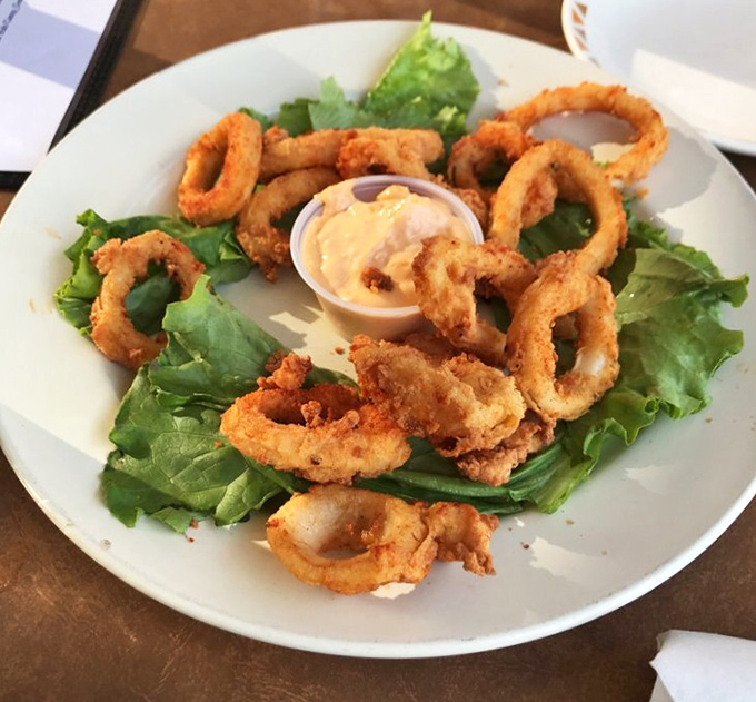 Calamari that defies the rubbery reputation of lesser versions. These golden rings are the jewelry of the sea, best adorned with a squeeze of lemon.