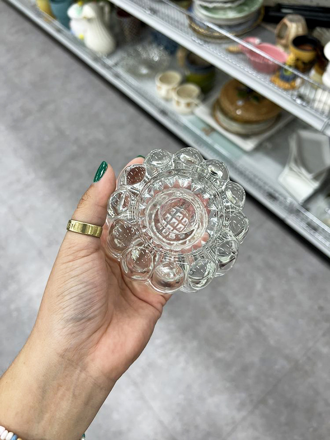 Someone's vintage glass candy dish awaits its next life as your new favorite conversation starter at dinner parties.
