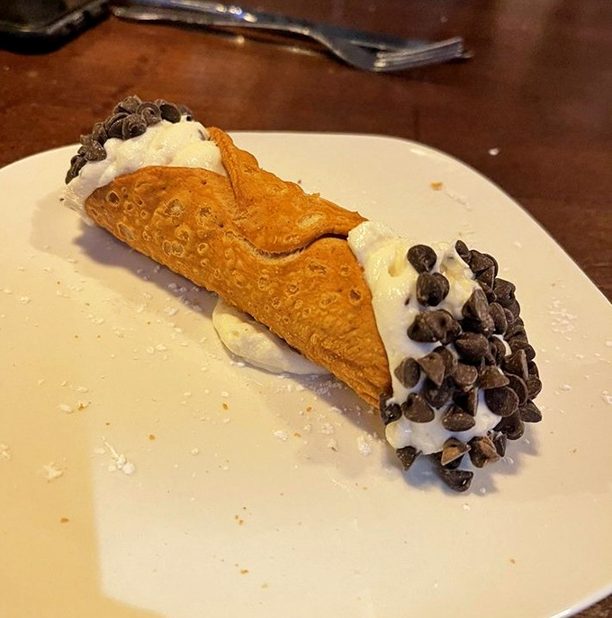 Not just any cannoli&mdash;a crisp shell embracing sweet, creamy filling with chocolate chips standing guard at both ends. Resistance is futile.