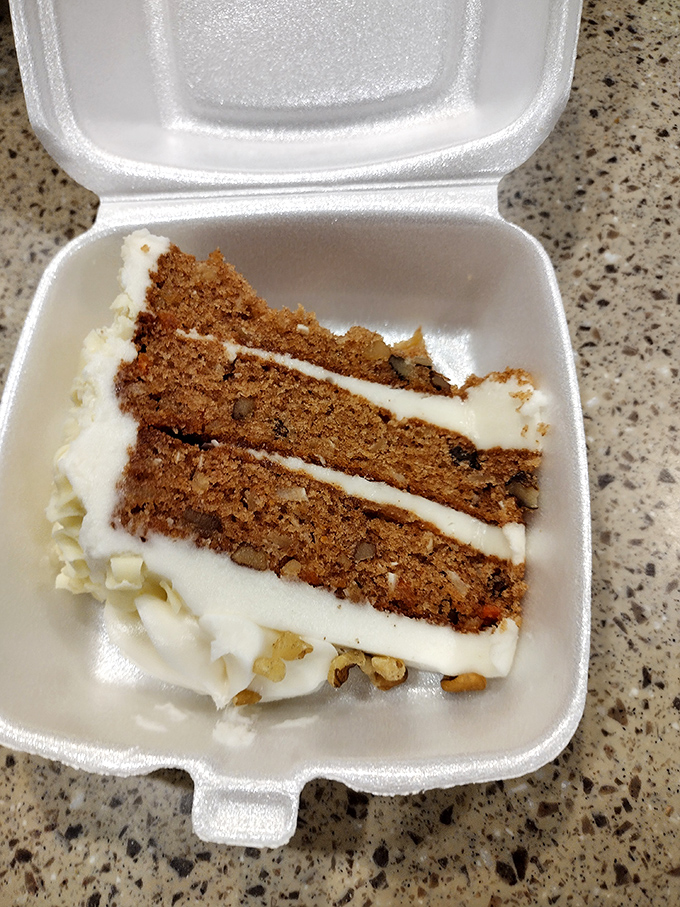 Carrot cake that doesn't just have layers – it has chapters, each telling a different sweet story.