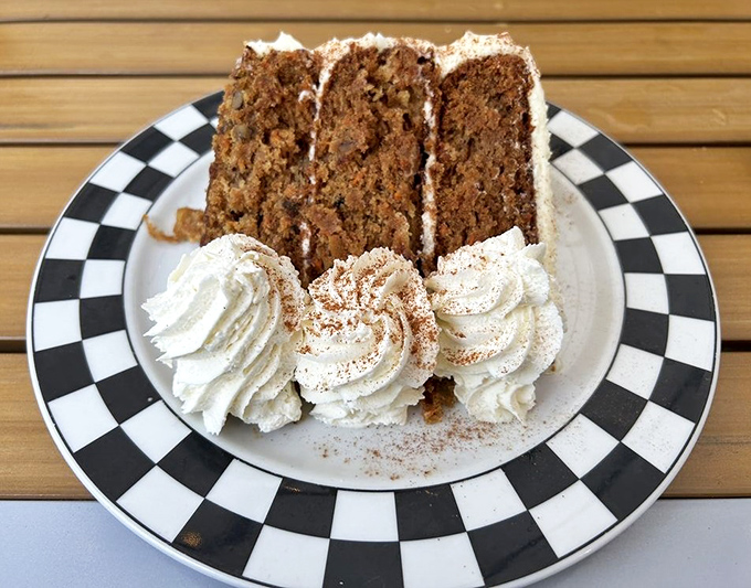 Carrot cake that actually makes you grateful for vegetables &ndash; three layers of spiced perfection crowned with pillowy cream cheese frosting.