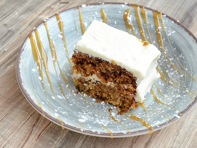 Carrot cake that makes you question why chocolate gets all the glory, with cream cheese frosting so perfect it deserves its own fan club.