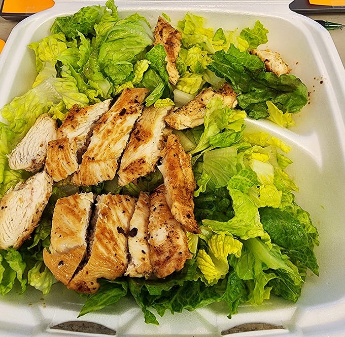 Fresh greens topped with grilled chicken that actually tastes like chicken &ndash; revolutionary concept, perfectly executed here.