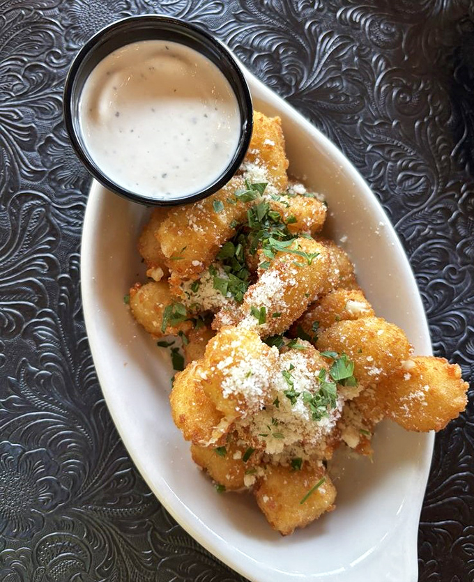 Cheese curds dusted with parmesan and herbs&mdash;because Wisconsin knows the only thing better than cheese is more cheese with a side of ranch.