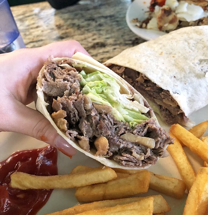 The cheesesteak wrap&mdash;Philadelphia's famous sandwich reimagined. Portable perfection with fries that deserve their own fan club.