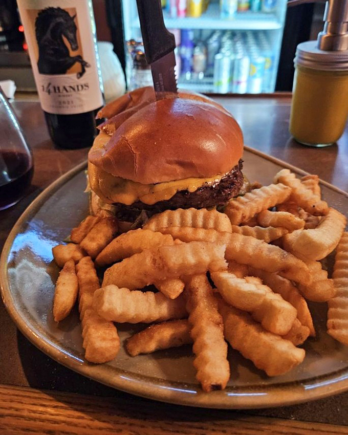 This isn't just a cheeseburger&mdash;it's therapy on a plate with a side of crinkle-cut fries that deserve their own fan club.