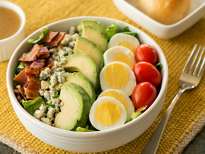 This isn't just a salad—it's a colorful rebellion against boring lunches, arranged with the precision of a Renaissance painting.