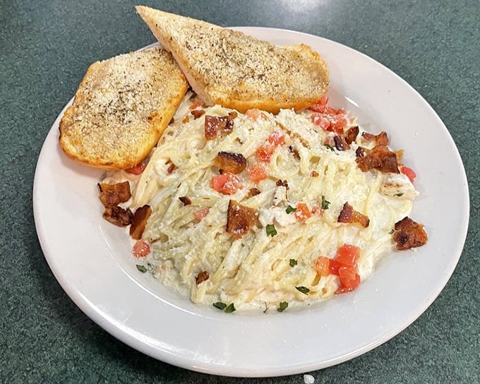 Pasta that doesn't just sit on the plate but makes itself at home, with toast points standing by for the inevitable sauce-sopping finale.