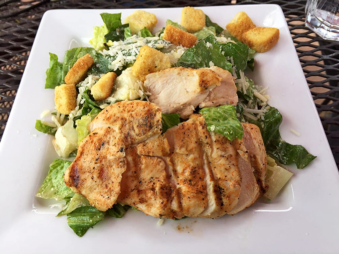 This chicken Caesar salad isn't just phoning it in&mdash;it's bringing its A-game with perfectly grilled meat and house-made croutons that crunch like autumn leaves.