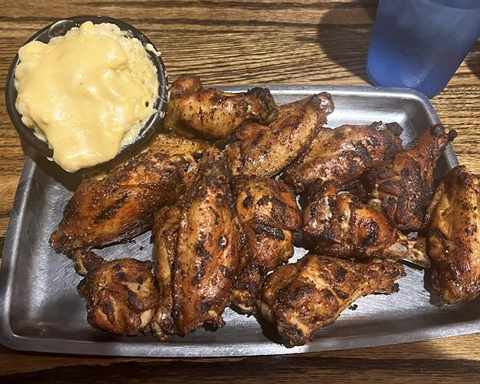 These wings have clearly been introduced to heat in all the right ways&mdash;crispy, spice-crusted, and served with a side of creamy relief.