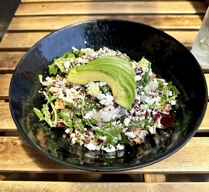 A salad that people actually want to eat! Fresh greens, vibrant veggies, and avocado slices arranged with the care of a Renaissance painting.