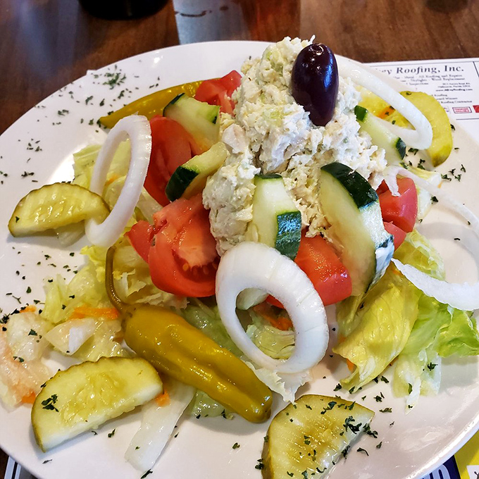 A Greek salad that actually makes eating vegetables exciting, with enough feta cheese to remind you that healthy doesn't mean boring.