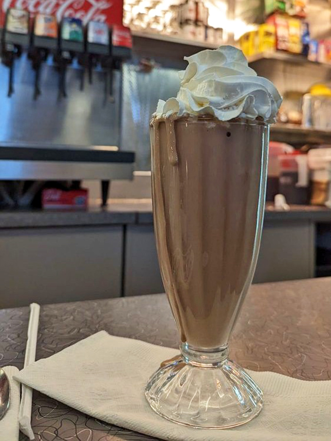 This chocolate milkshake isn't just a drink&mdash;it's dessert with a straw. That mountain of whipped cream is practically begging for a selfie.