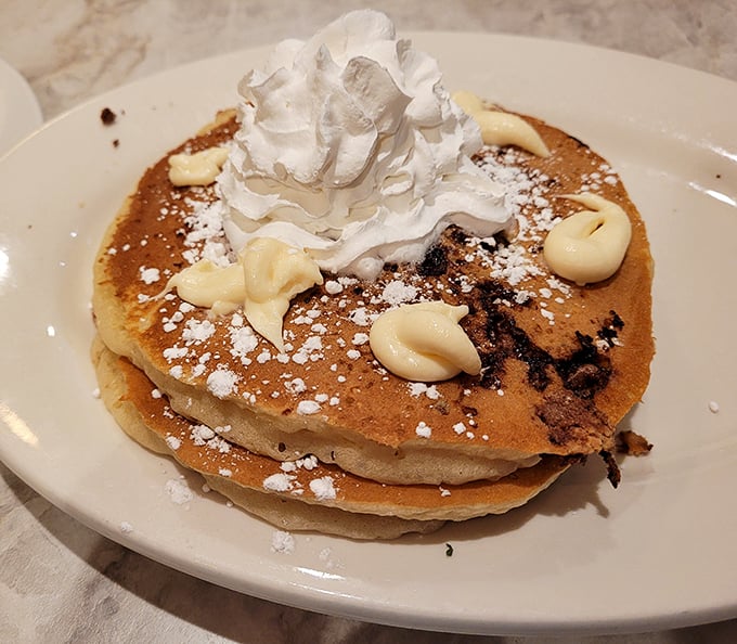 Chocolate chip pancakes with whipped cream&mdash;the breakfast that makes adults remember why being a kid was so wonderful.