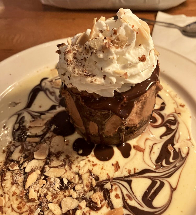 The Chocolate Island dessert doesn't just end your meal&mdash;it throws a party for your taste buds with chocolate, whipped cream, and artistic drizzles worthy of a museum.