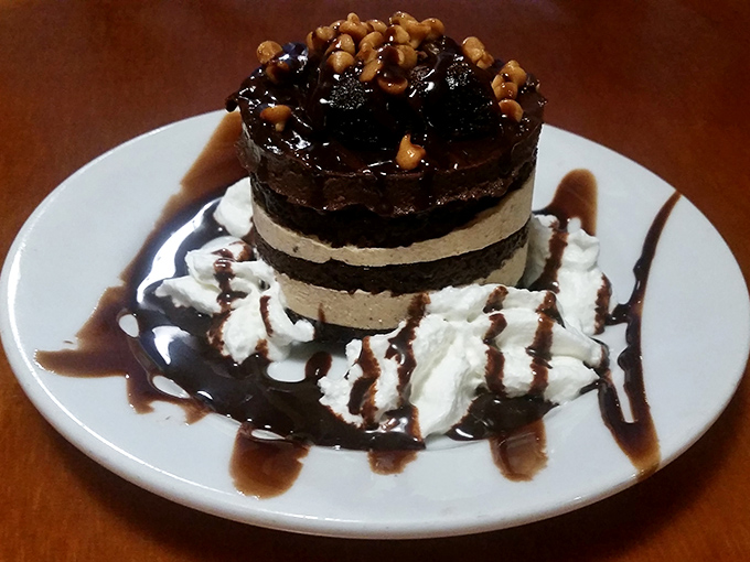 This chocolate mousse doesn't just end your meal—it throws a farewell party complete with whipped cream confetti and caramel streamers.