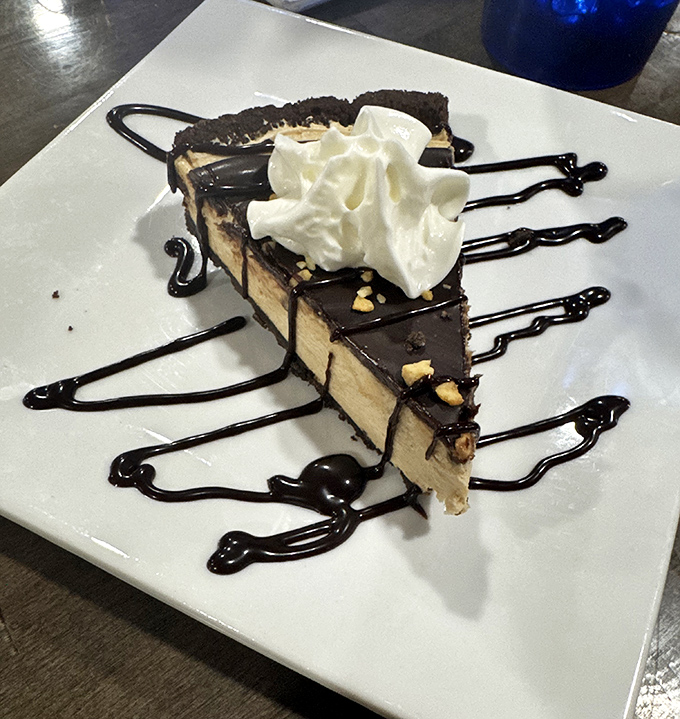 Chocolate peanut butter pie that makes sharing a moral dilemma. That artful chocolate drizzle is practically signing divorce papers for you and your diet.