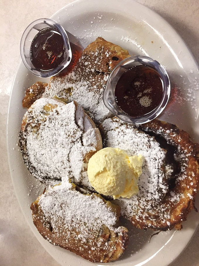 French toast that's crossed over to the dessert dimension, dusted with powdered sugar and crowned with ice cream&mdash;breakfast's ultimate promotion.