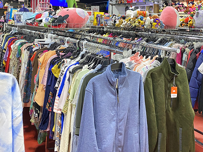 The clothing section stretches into infinity, a textile rainbow where yesterday's fashion trends await their inevitable comeback.
