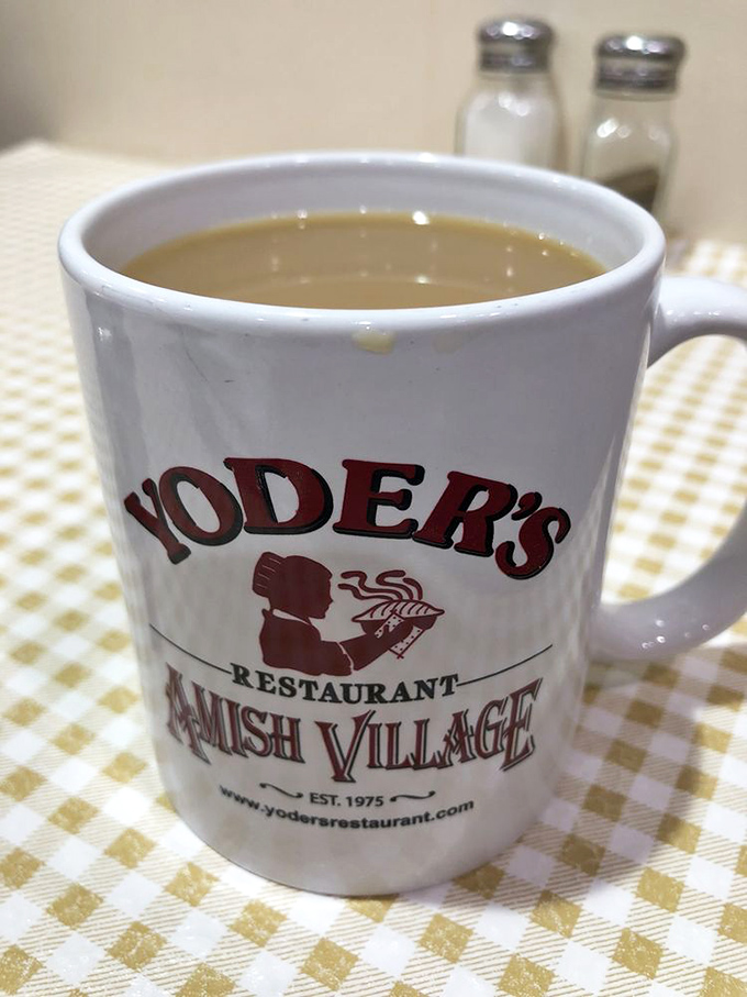 Coffee served in a mug that tells you exactly where you are and exactly what you're in for. Morning fuel, Amish-style.