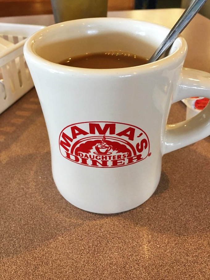 The coffee comes in mugs thick enough to withstand both the robust brew and the stories shared across the table.